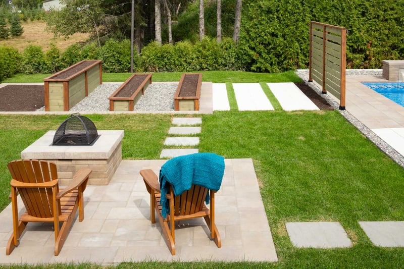 What materials should you choose to make your backyard look bigger?